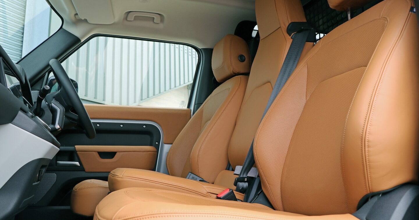 Front row jump seat and door card upgrade in leather for Land Rover ...